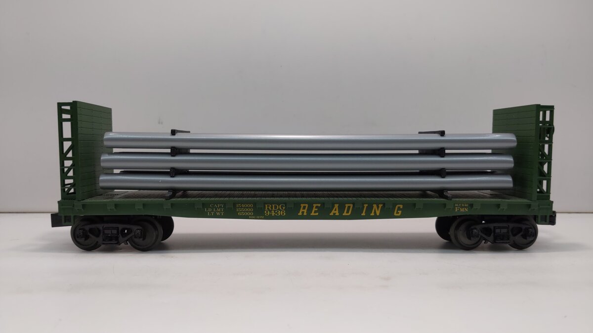 MTH 30-76362 Reading Flat Car - w/Bulkheads & Pipe Load – Trainz