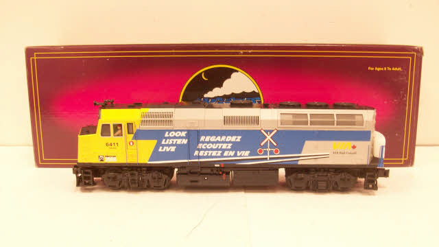 MTH 20-2799-1 VIA F40PH Diesel Engine w/Proto-Sound 2.0 #6411 – Trainz